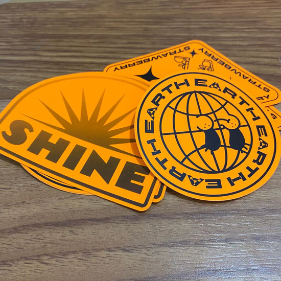 Cetak Sticker Neon Orange Murah Online di Malang